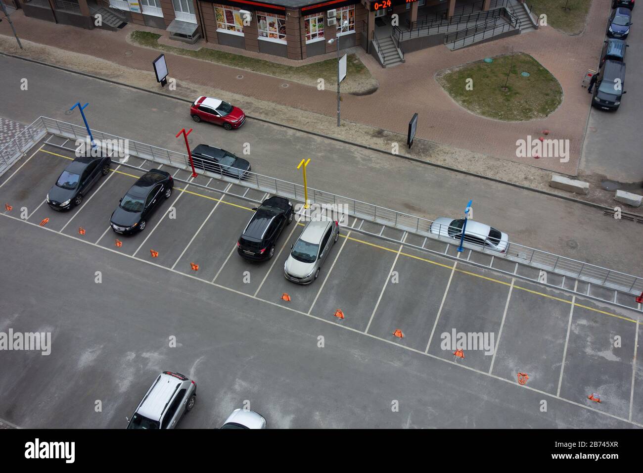 Car parking aerial top view. Occupied and vacant lots with vehicles ...
