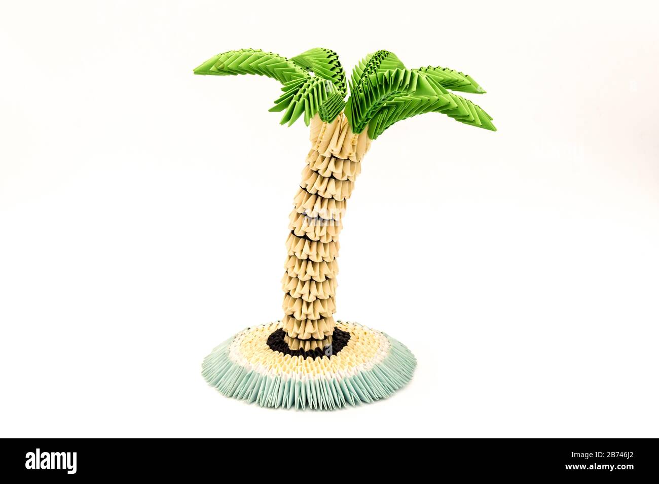 Palm tree constructed from paper on white background Stock Photo - Alamy