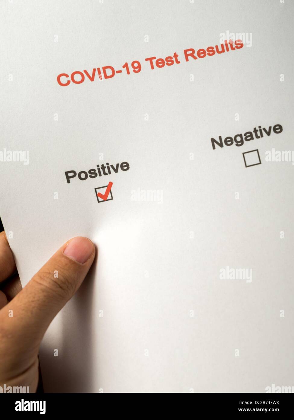 Corona virus test results sheet, positive, red color Stock Photo - Alamy