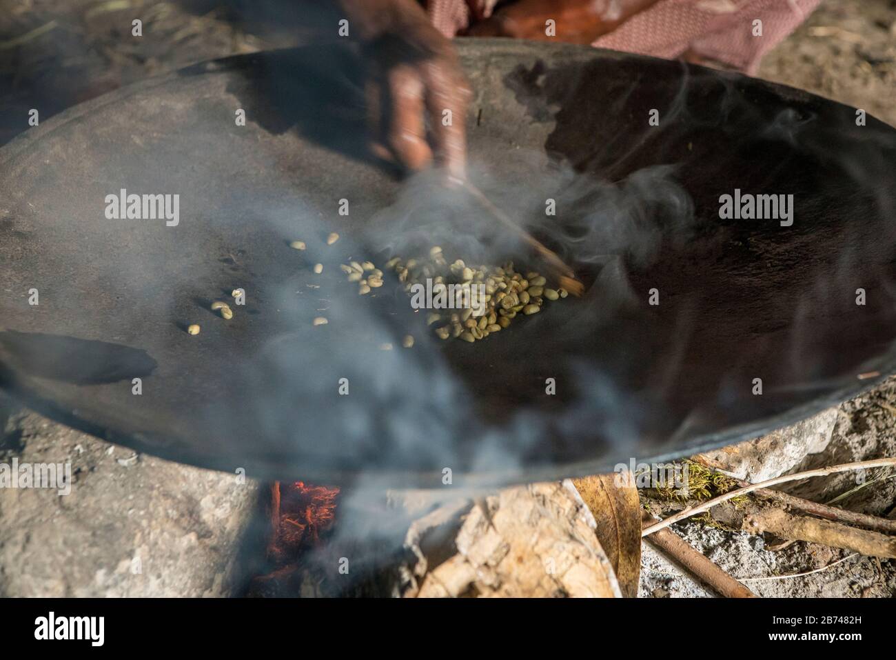 Roasting coffee beans over fire hi-res stock photography and images - Alamy
