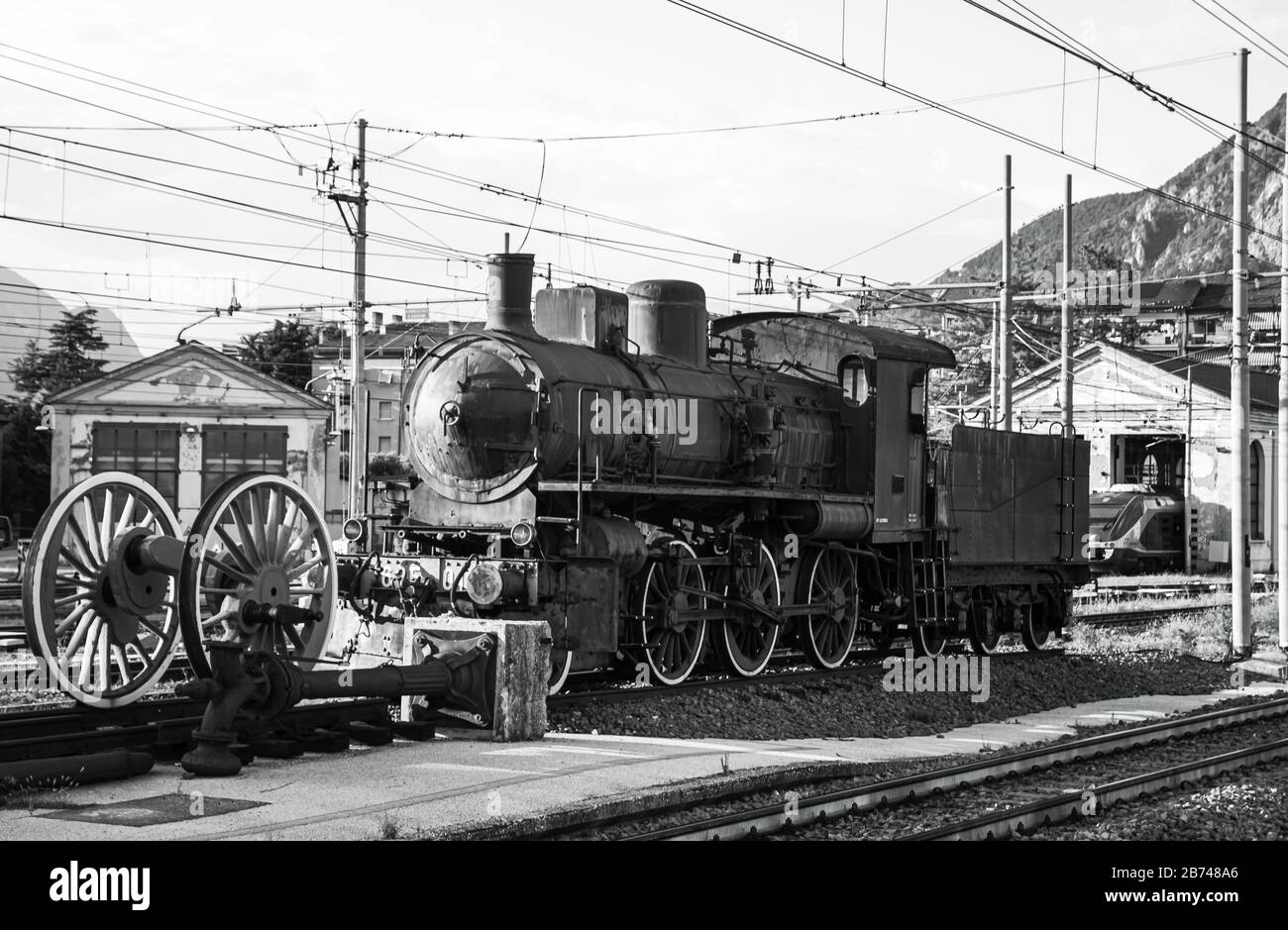 old locomotive (steam engine) on display at the Trento railway station ...