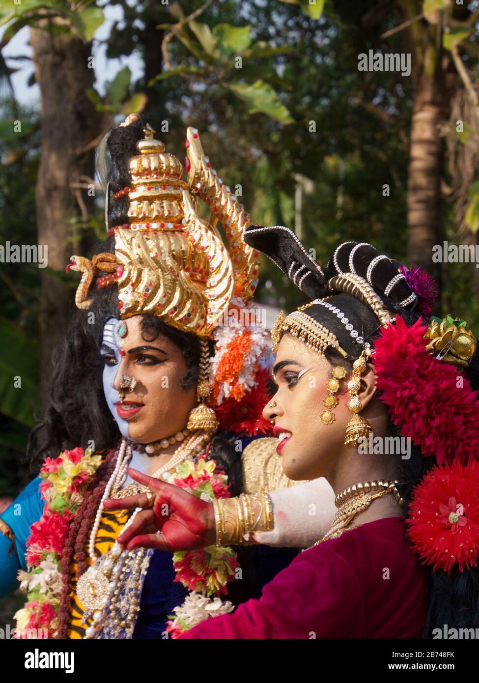 Classical Kathakali dancers depicting Hindu gods perform in temple ...