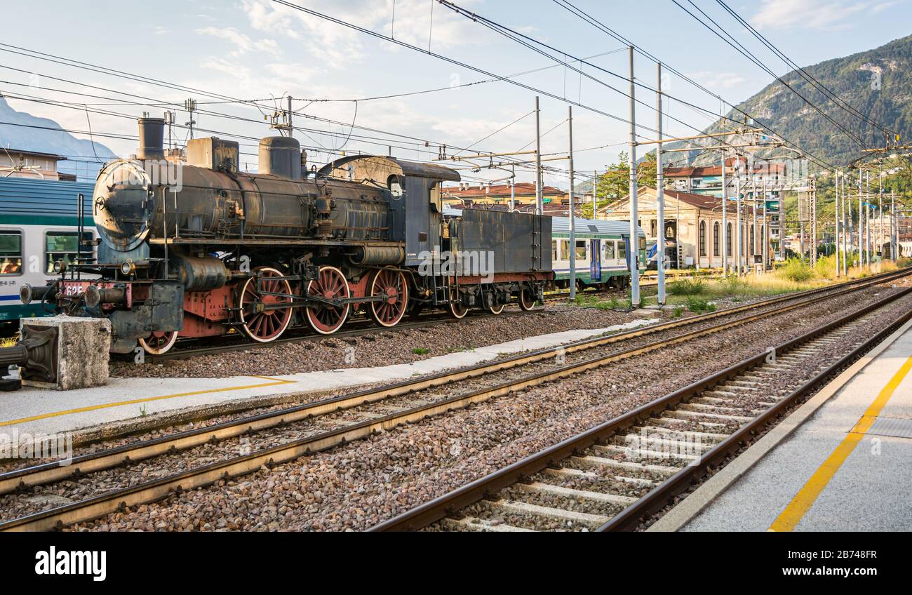 old locomotive (steam engine) on display at the Trento railway station ...