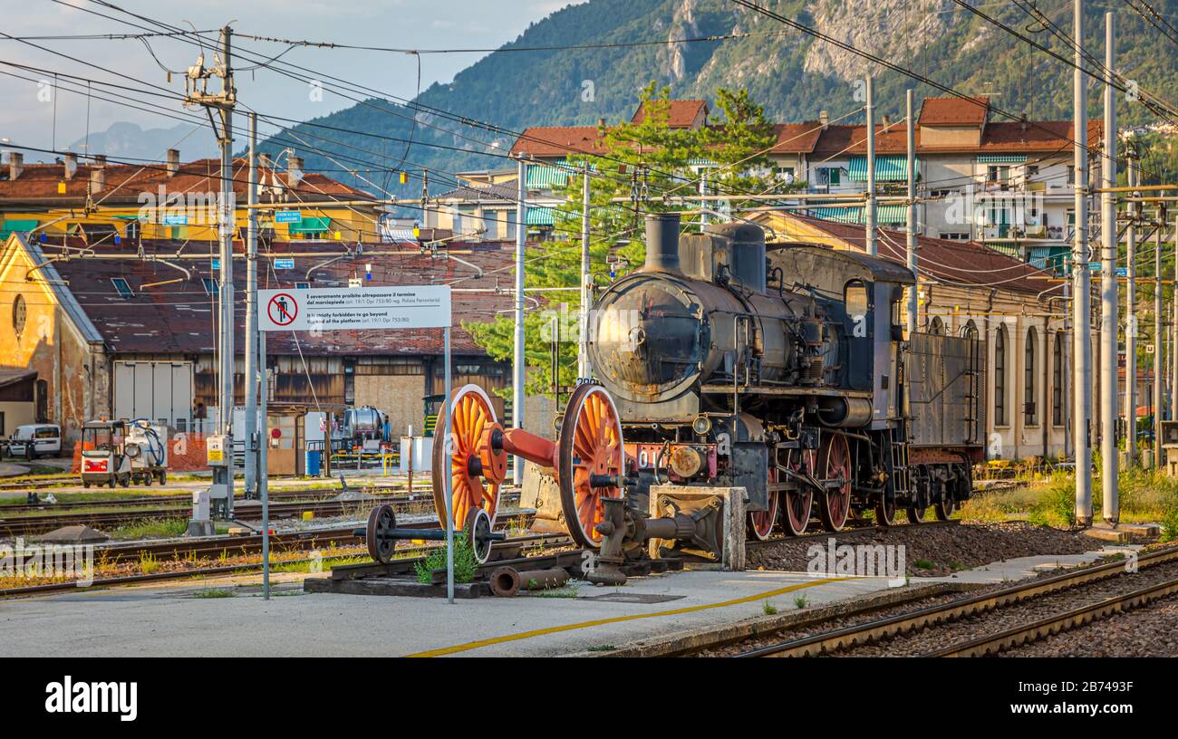 old locomotive (steam engine) on display at the Trento railway station ...