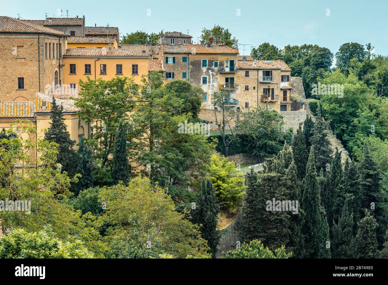 Residential houses of the old town built on a steep slope in a popular ...