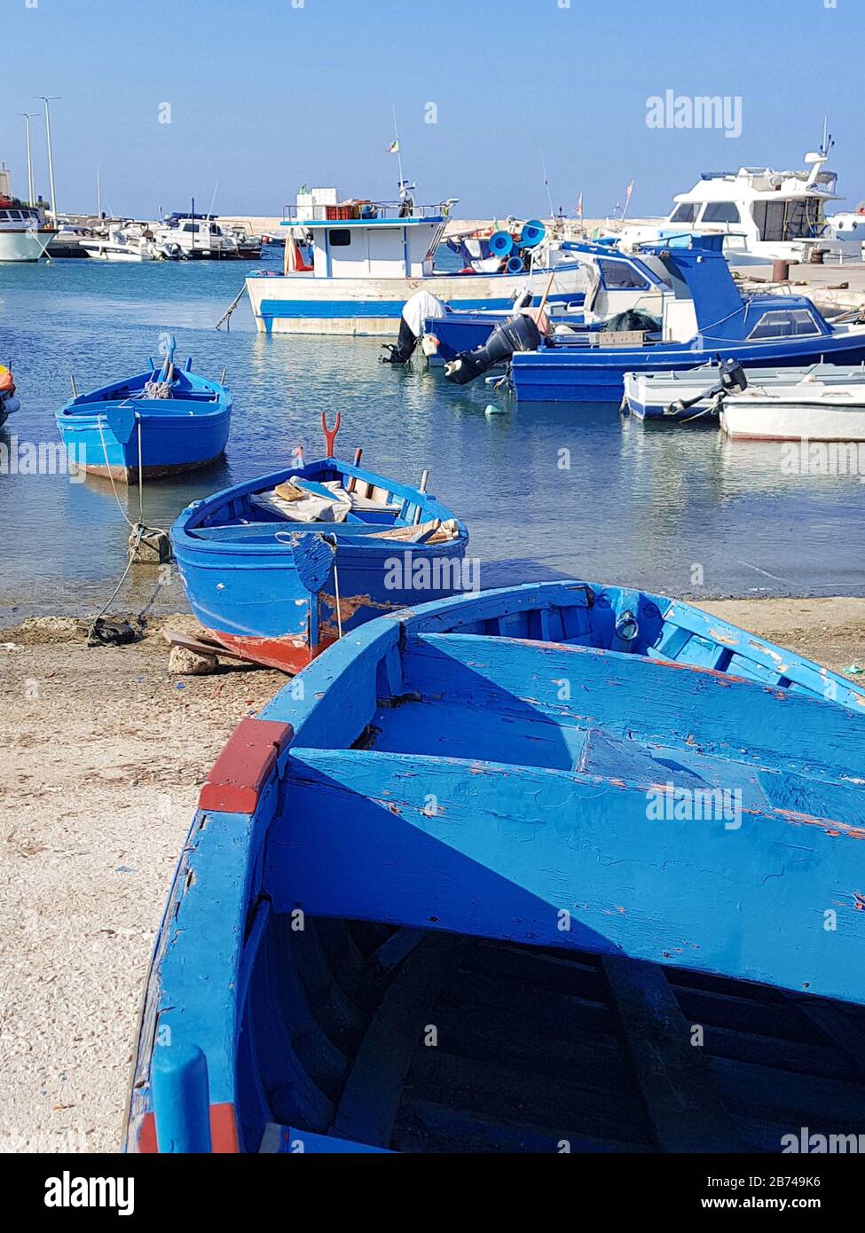 Small fishing boats in a harbour of Savelletri, Puglia, italy Stock ...
