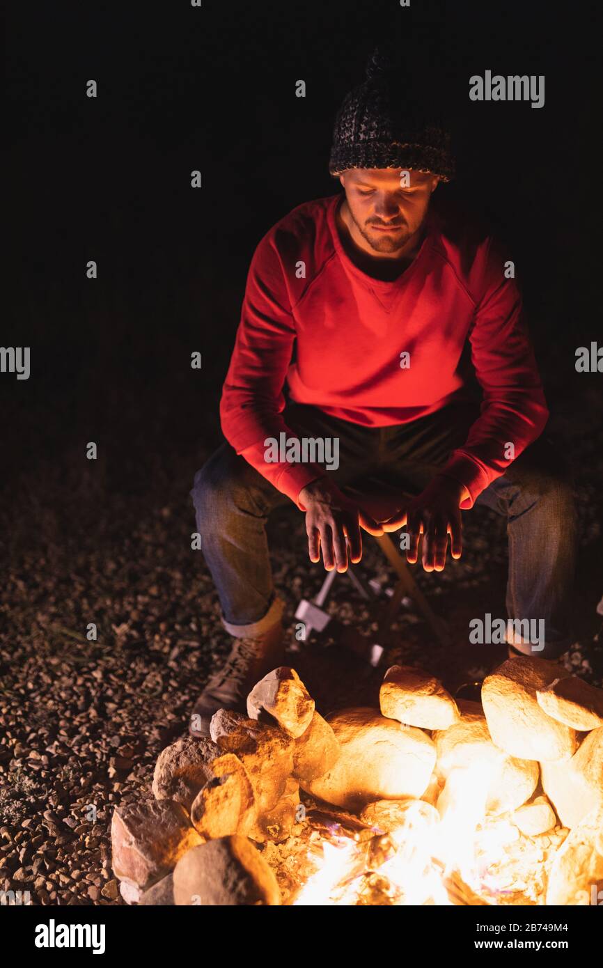 Warming hands fire hi-res stock photography and images - Alamy