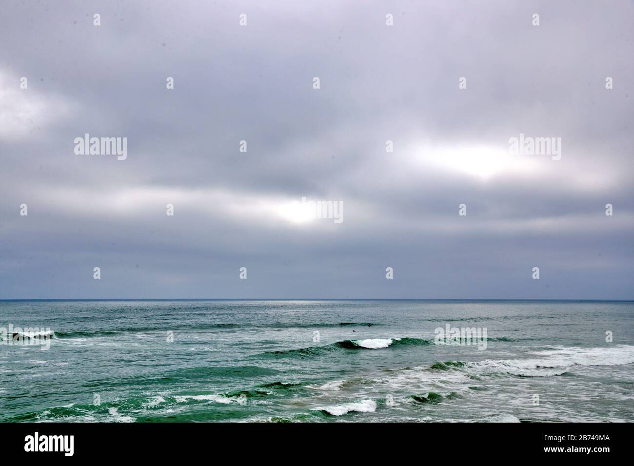 loudy sky over ocean Stock Photo - Alamy