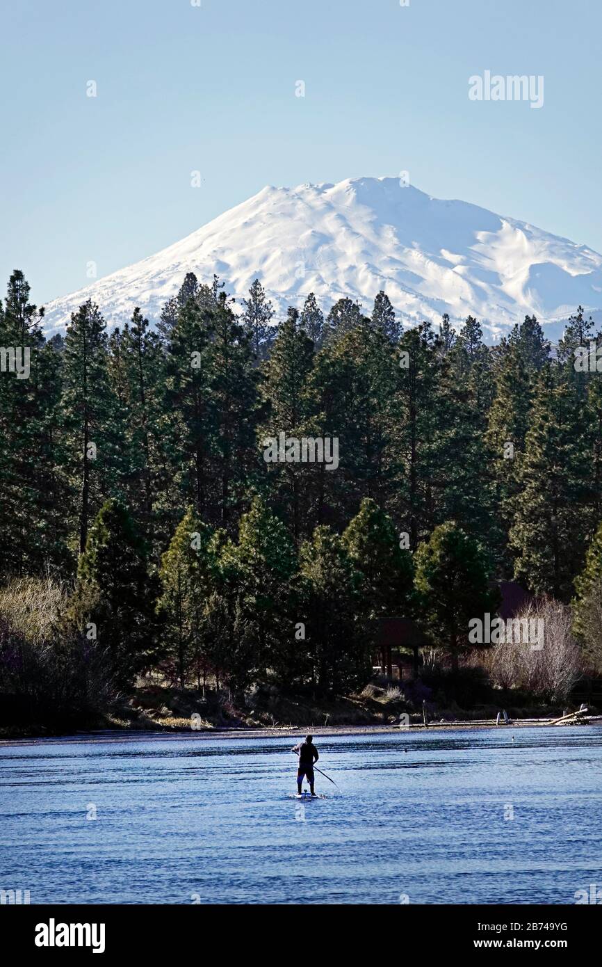 Man woman male female paddle paddling hi-res stock photography and ...