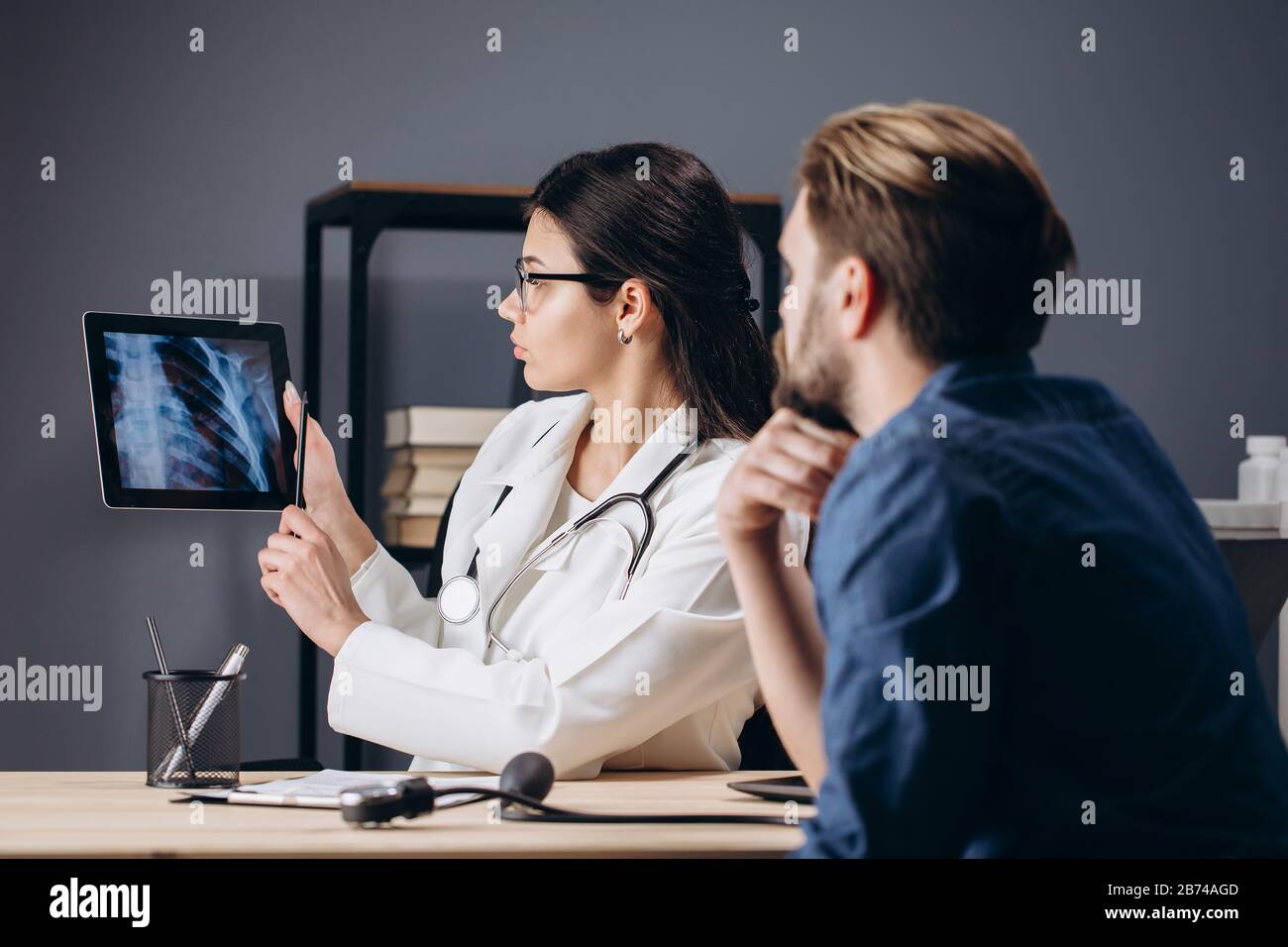 Female doctor using medication hi-res stock photography and images - Alamy