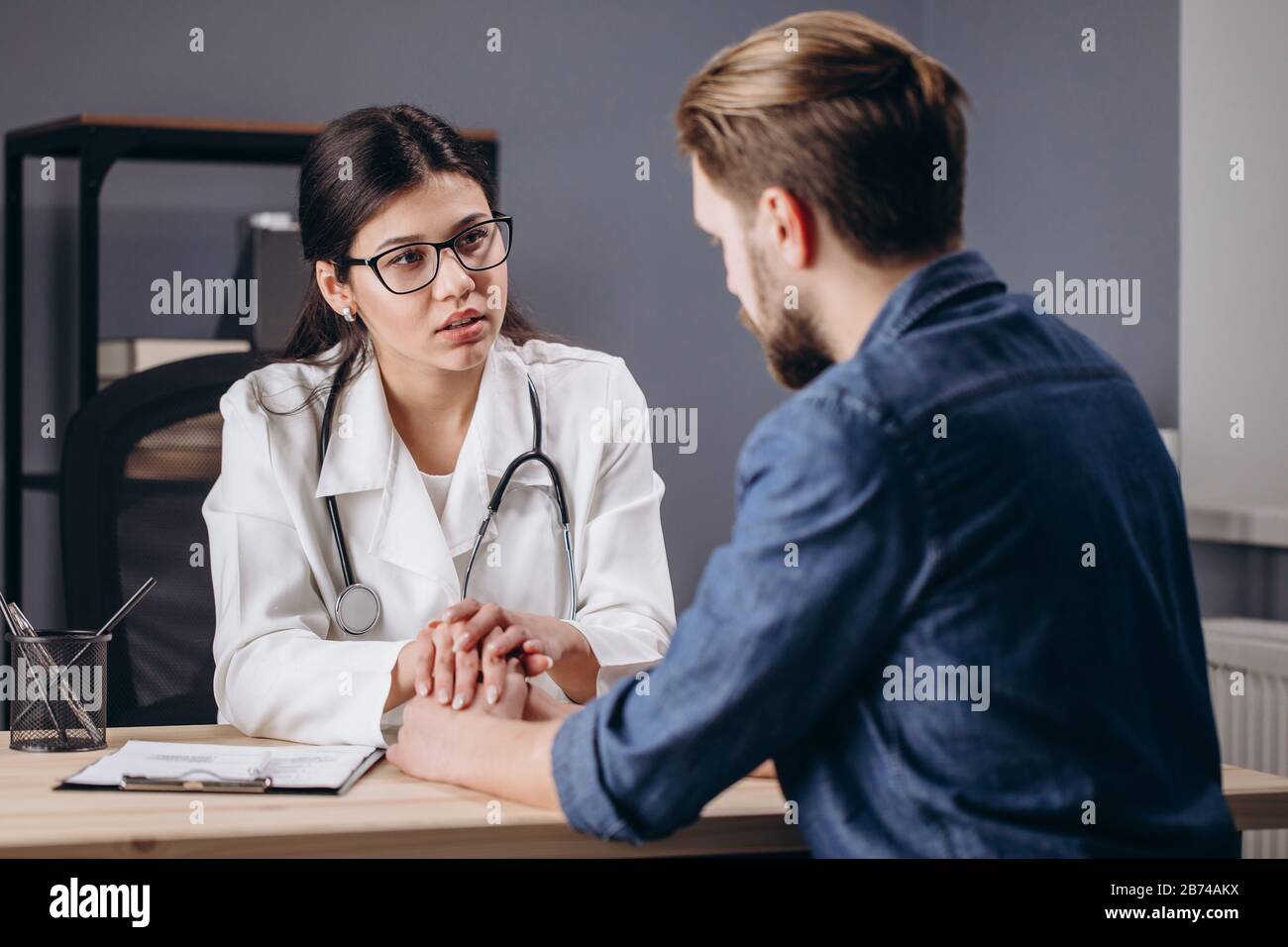 Sympathetic hi-res stock photography and images - Alamy