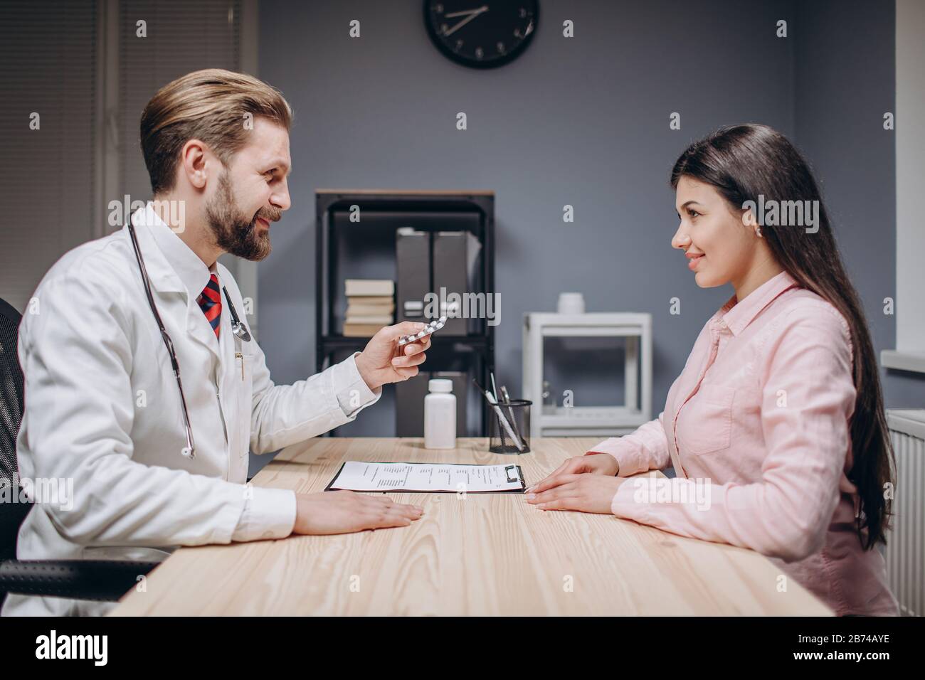 Smiling Smart Bearded Doctor Giving Drug Prescription Stock Photo - Alamy
