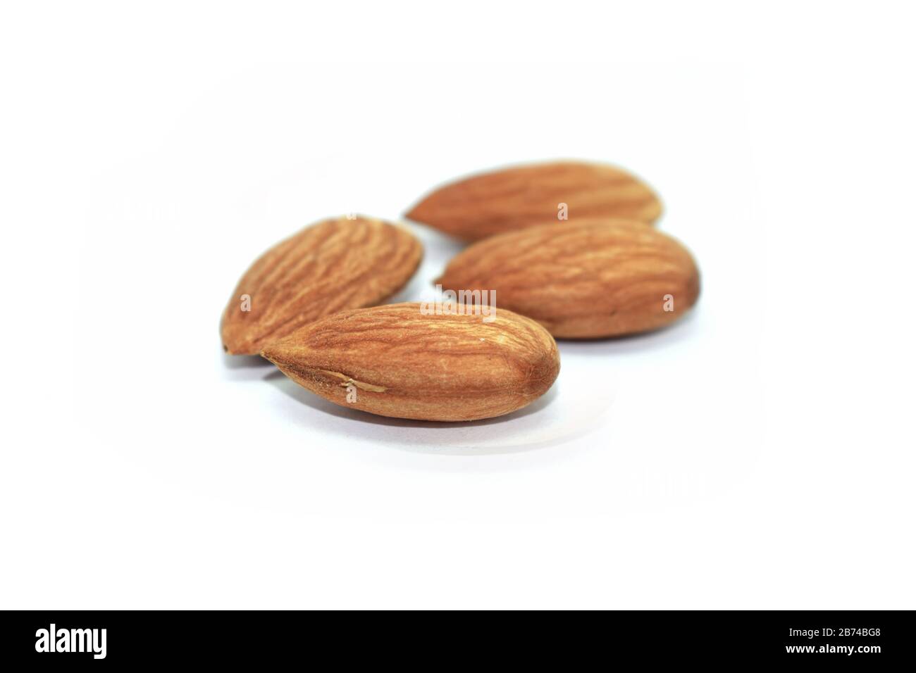Almond isolated on white background Stock Photo - Alamy