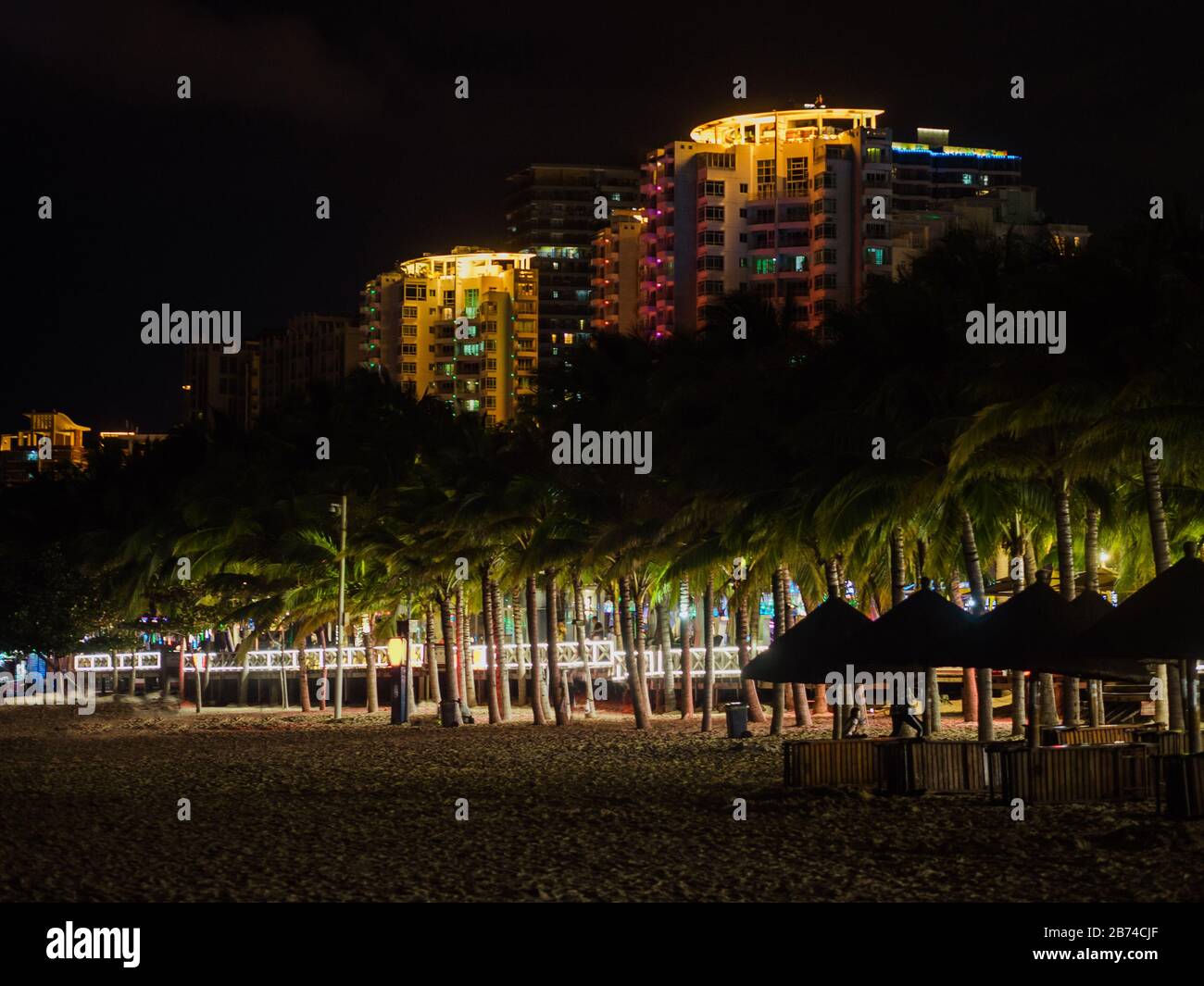 Night beach with cafe Stock Photo - Alamy