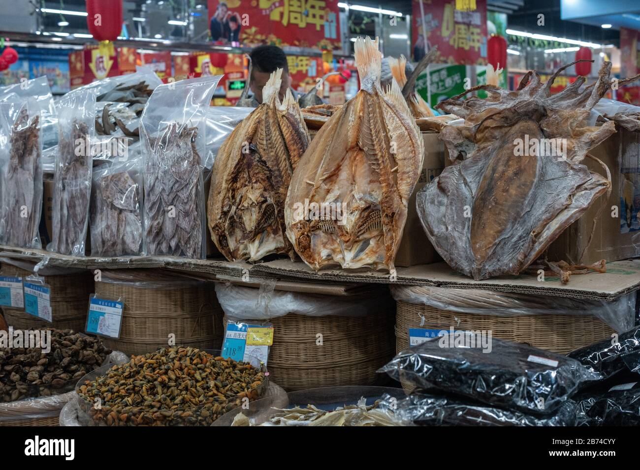Dry fish in asian store Stock Photo - Alamy
