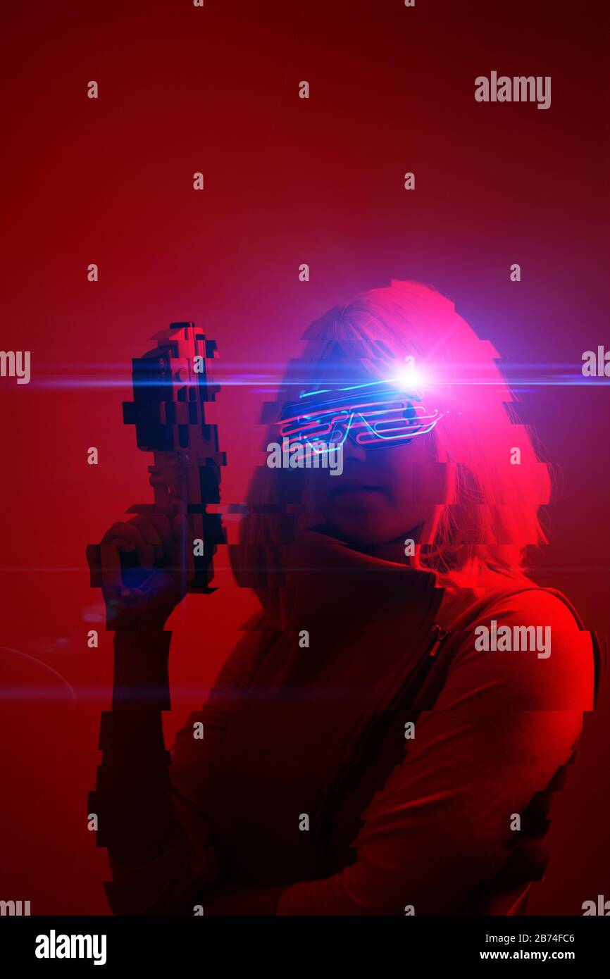Girl with blaster in the futuristic battle. Concept virtual reality ...