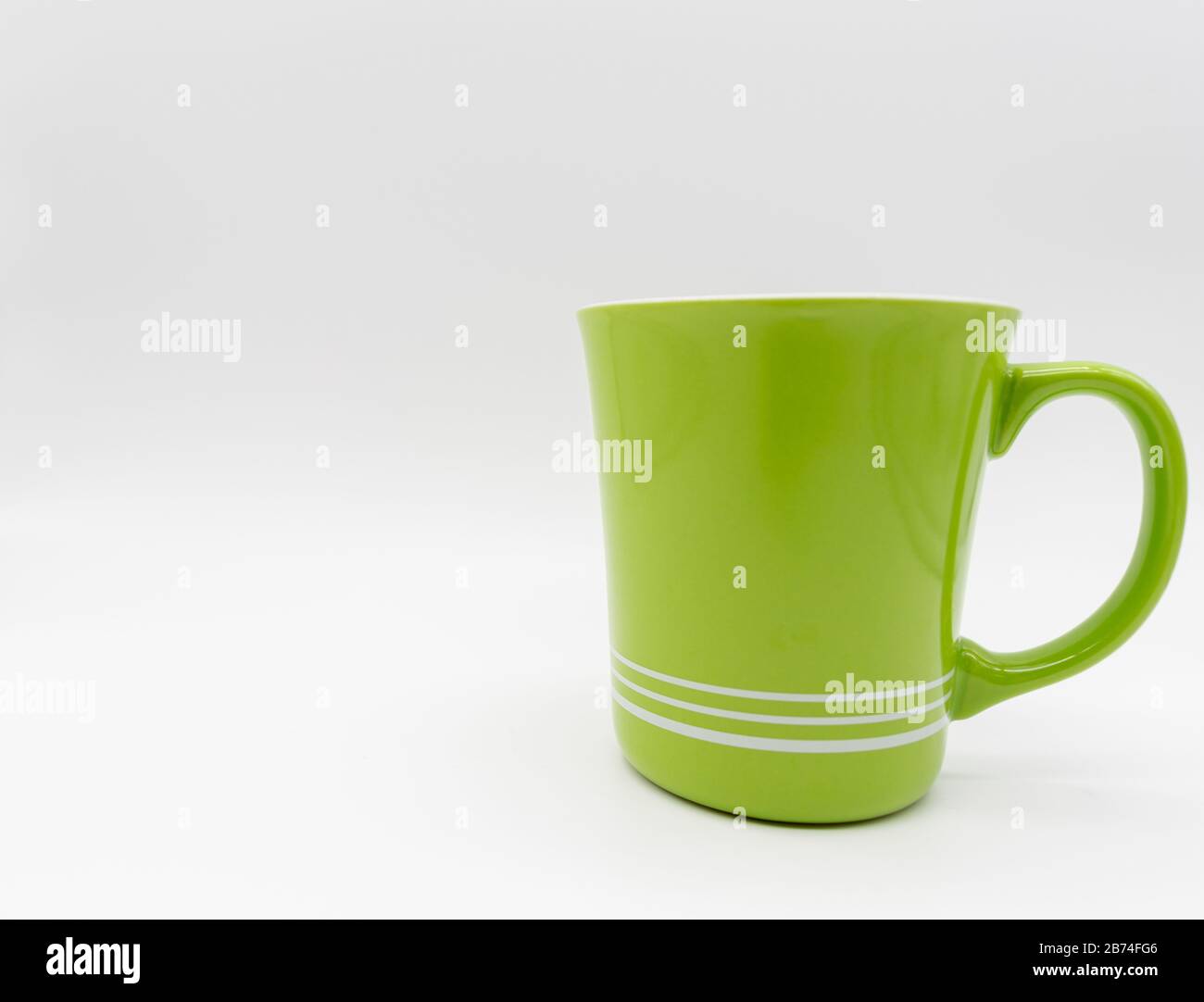 A Single Green Mug Ready for Anything Stock Photo - Alamy