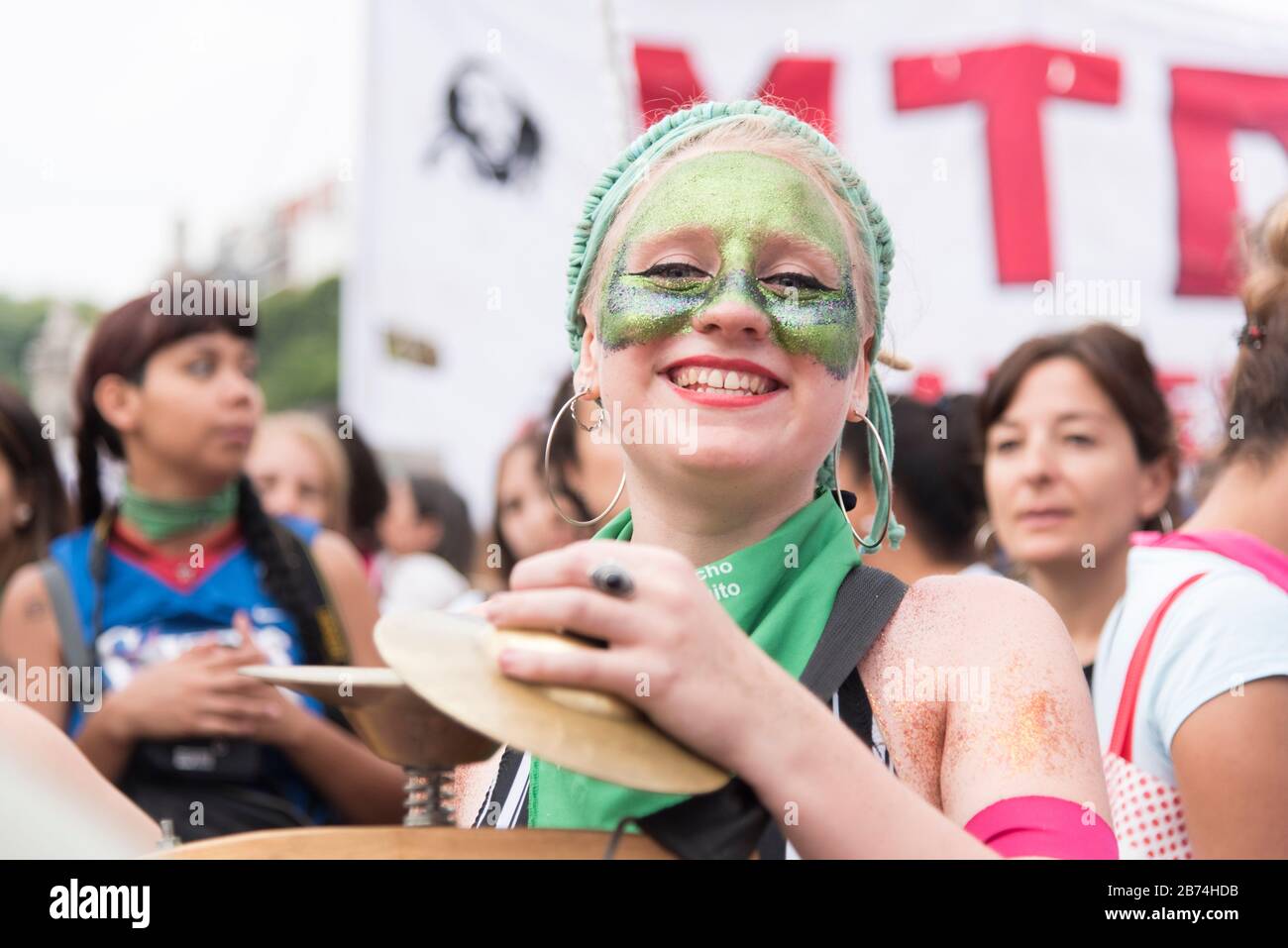 Woman wearing green handkerchief hi-res stock photography and images ...