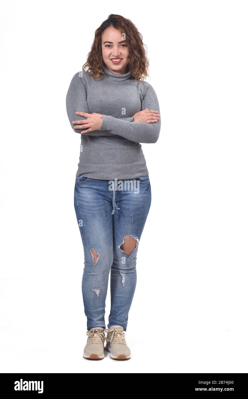 full portrait of woman standing on white background, arms crossed Stock ...