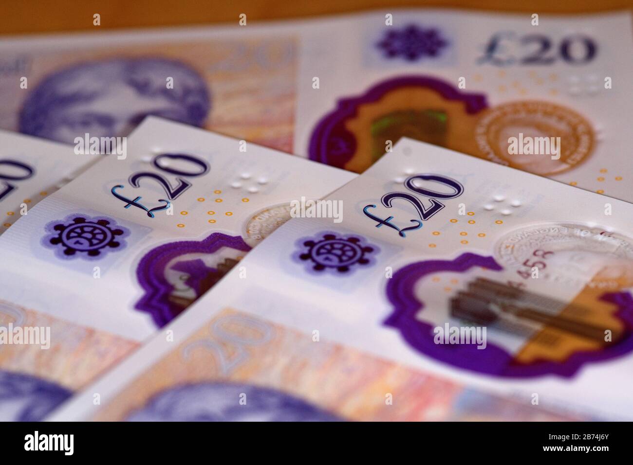 uk twenty pound notes trapped in mousetrap Stock Photo - Alamy