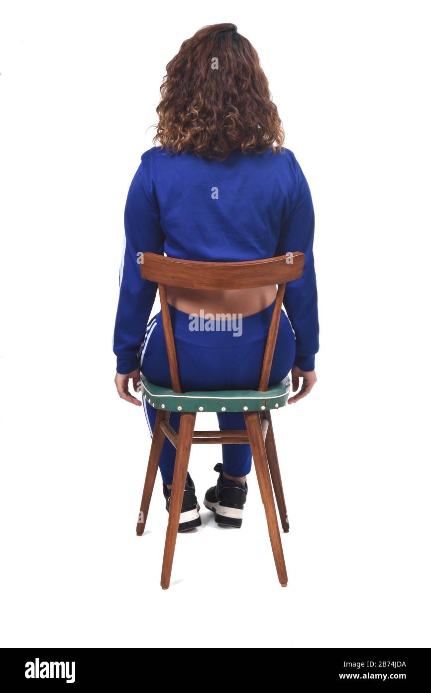rear view of a woman sitting on her back with white background Stock ...
