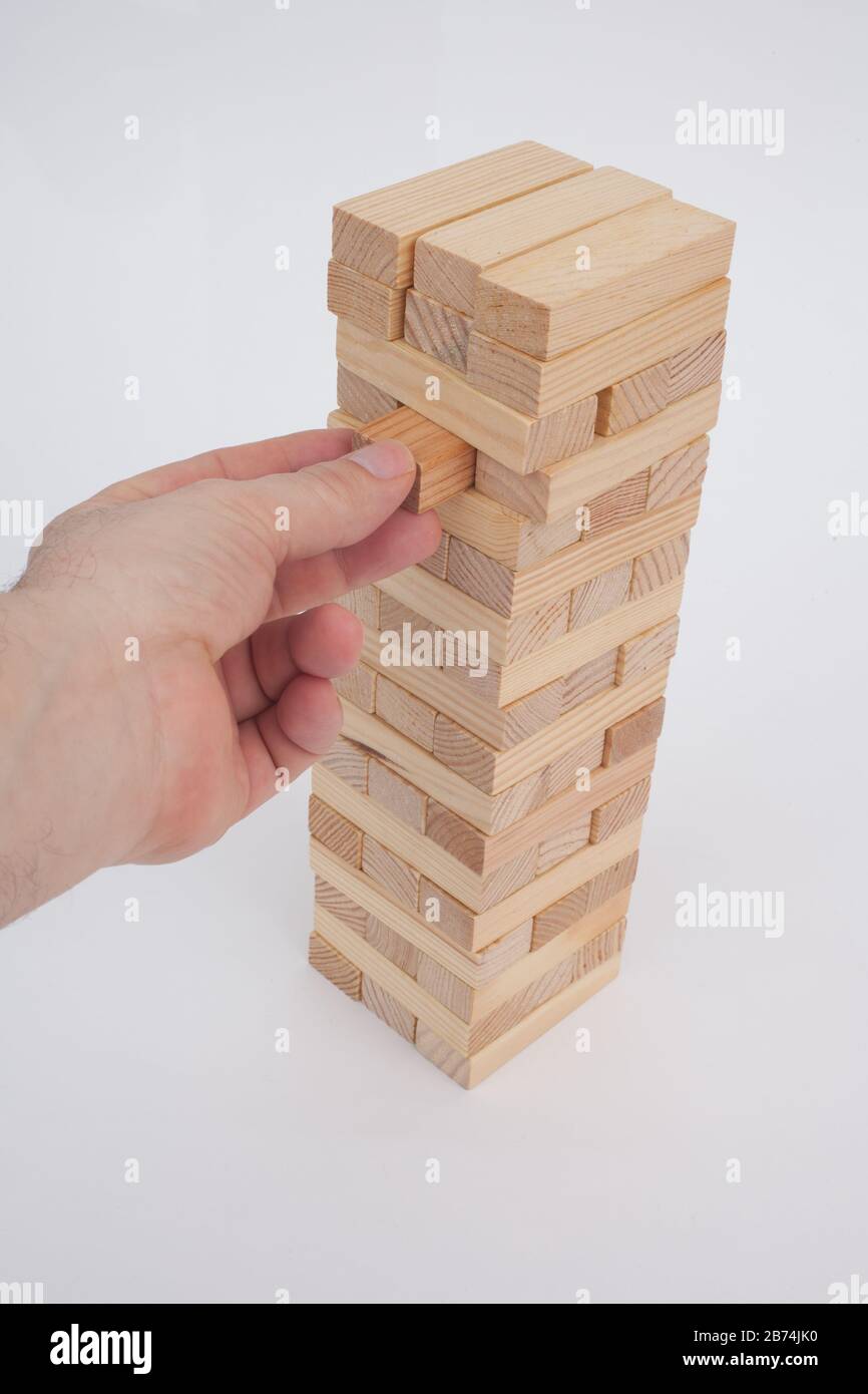 Knocking over blocks hi-res stock photography and images - Alamy