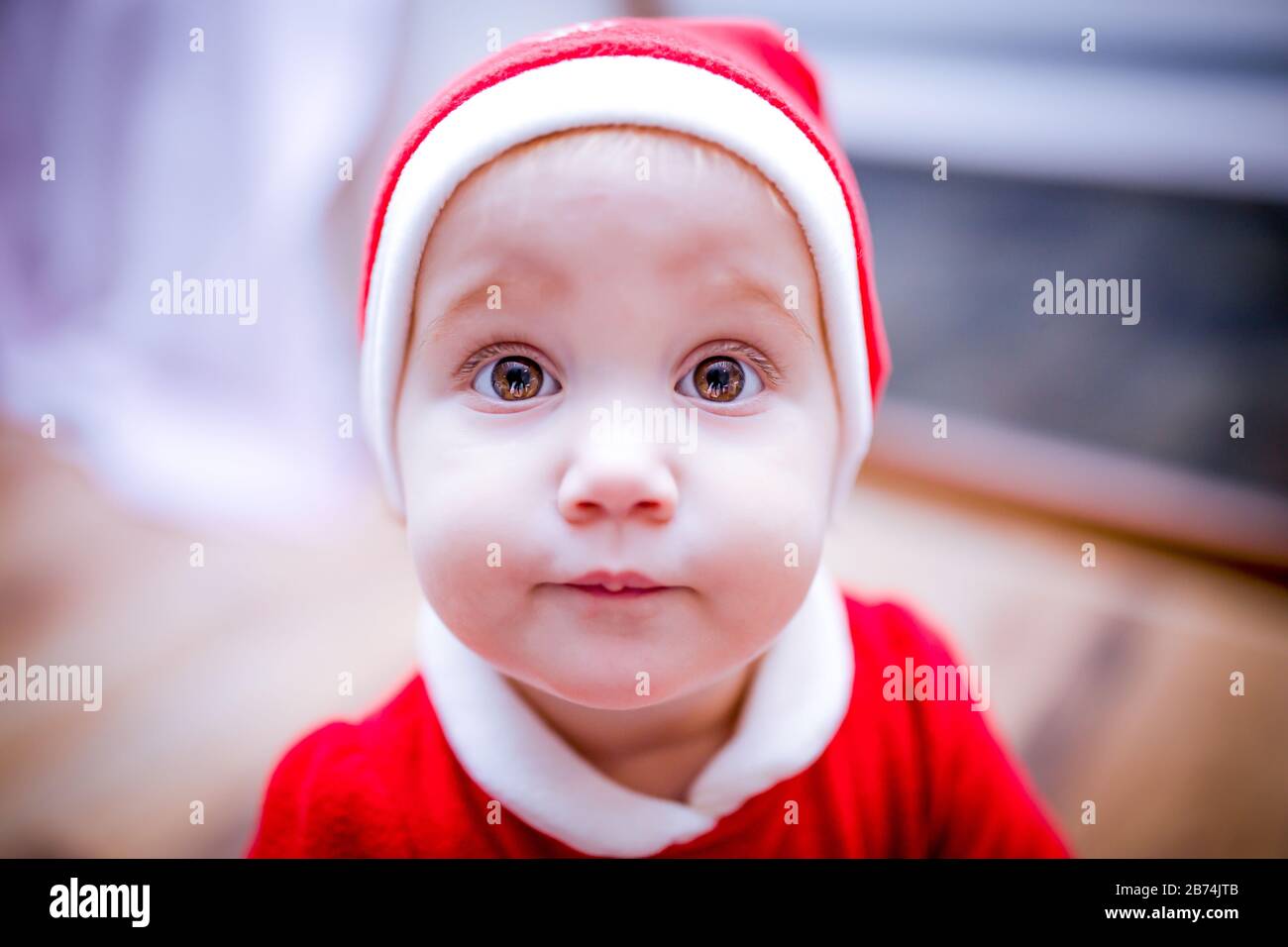 little santa kid Stock Photo - Alamy