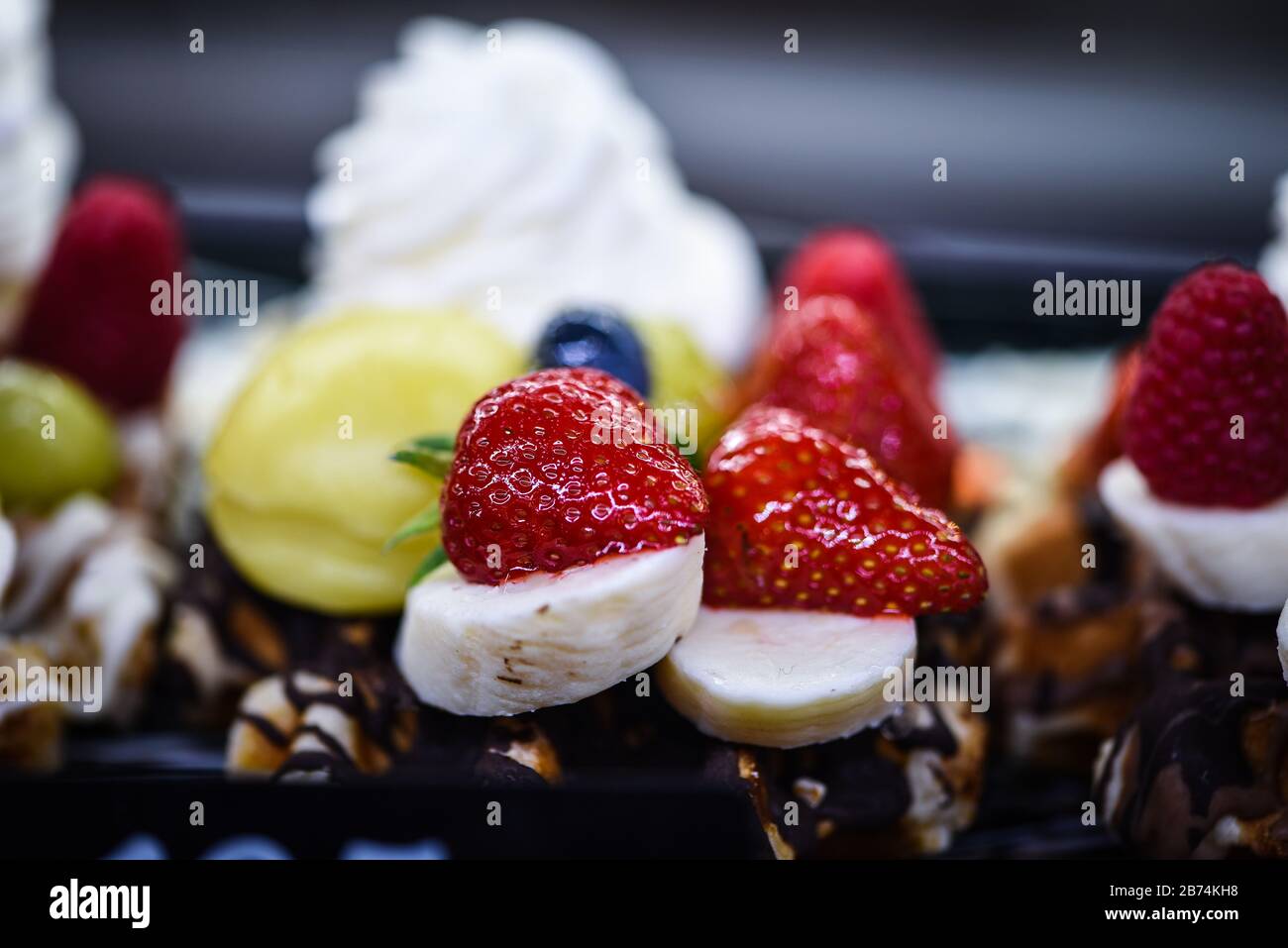 delicious mix mini cakes close up Stock Photo - Alamy