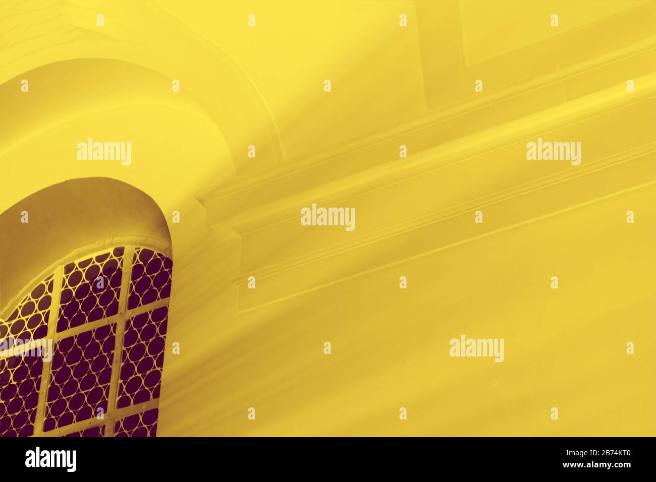 Light rays through the window. Yellow toned photo Stock Photo - Alamy