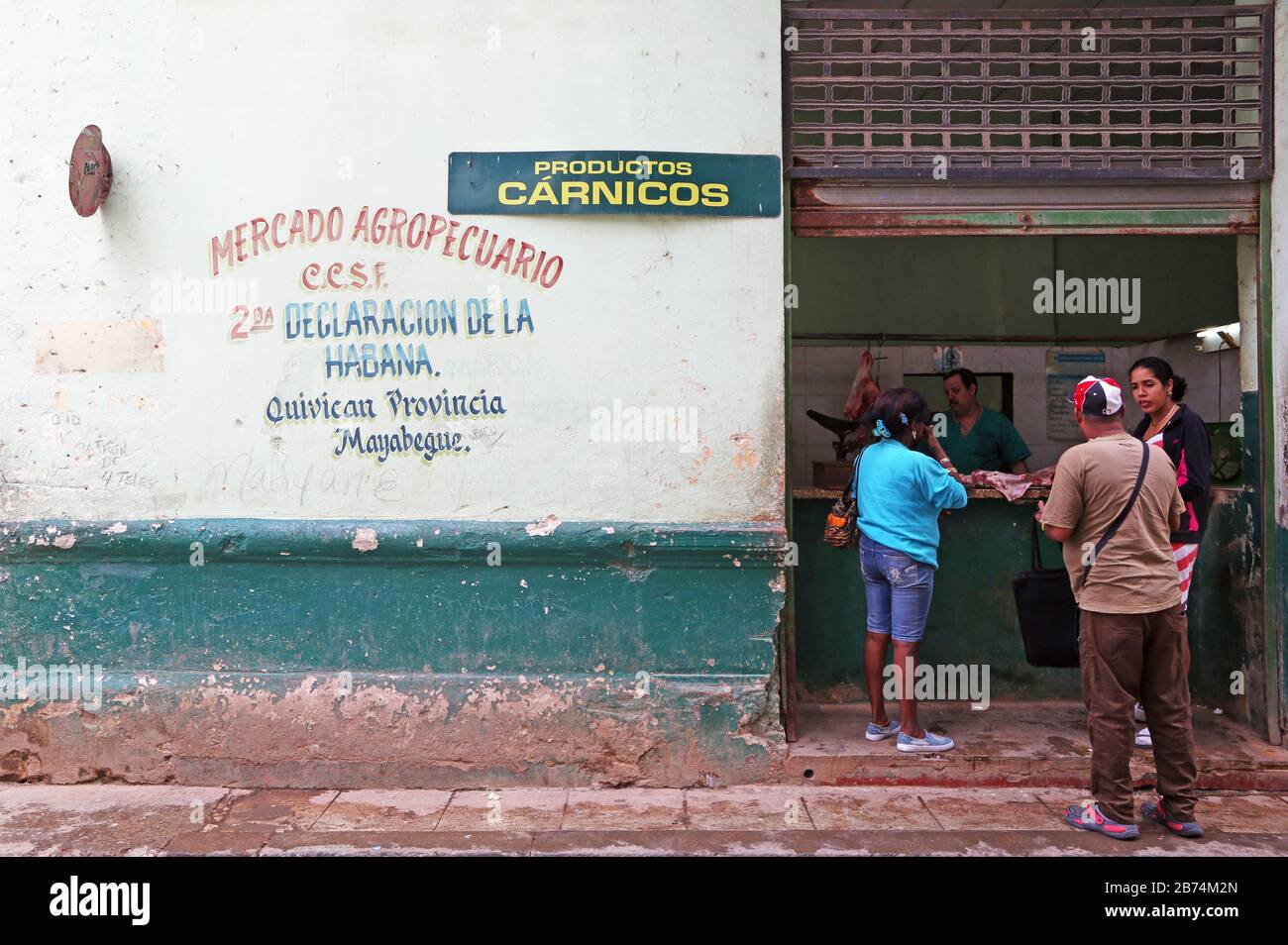 People in a butcher's shop of Havana, Cuba Stock Photo - Alamy