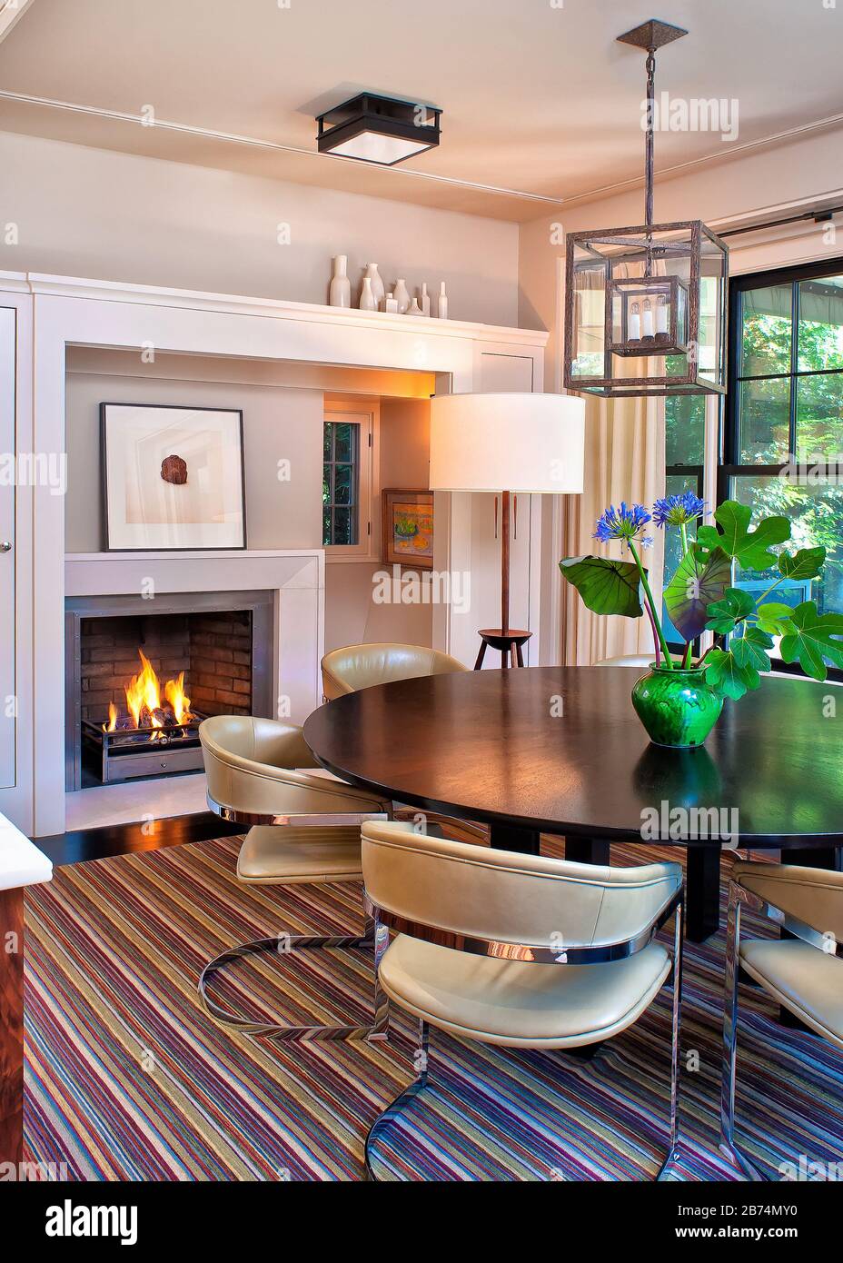 Breakfast room with fireplace Stock Photo - Alamy