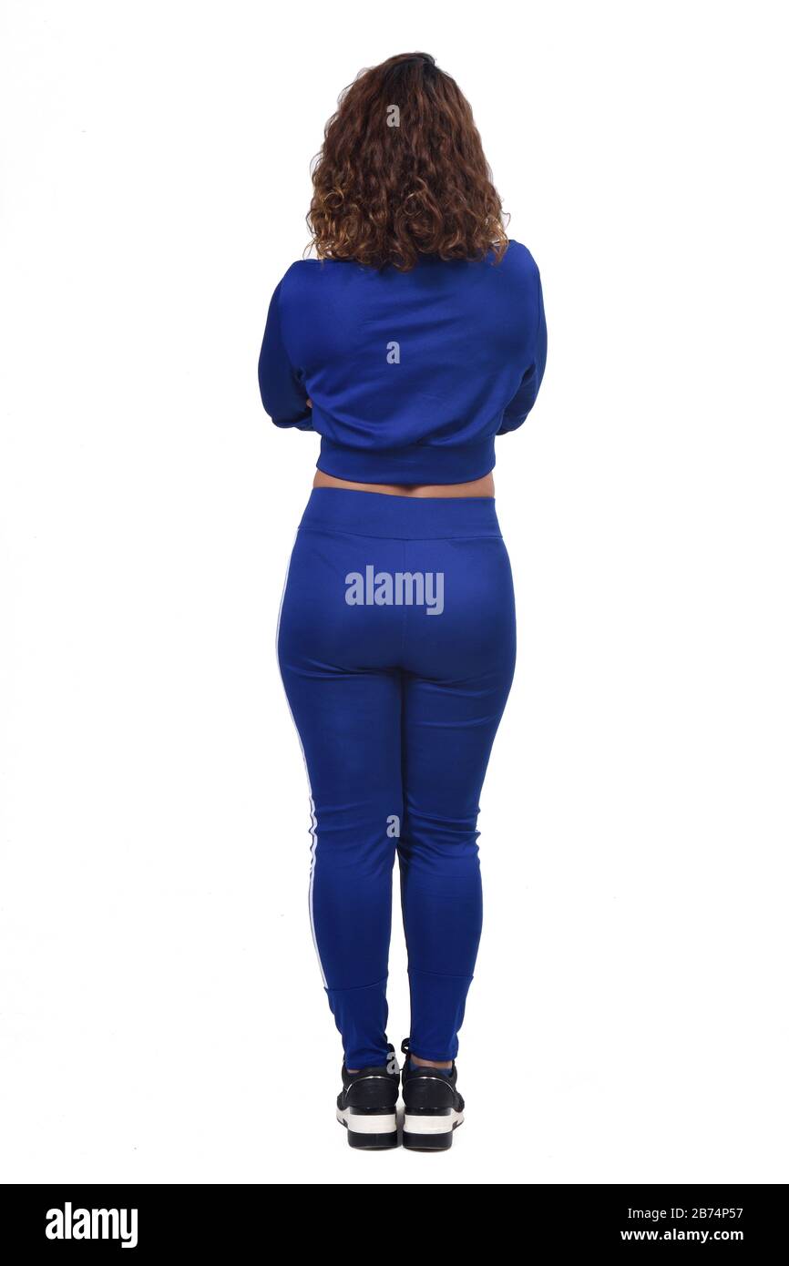 back view of a woman in white background, arms crossed Stock Photo - Alamy