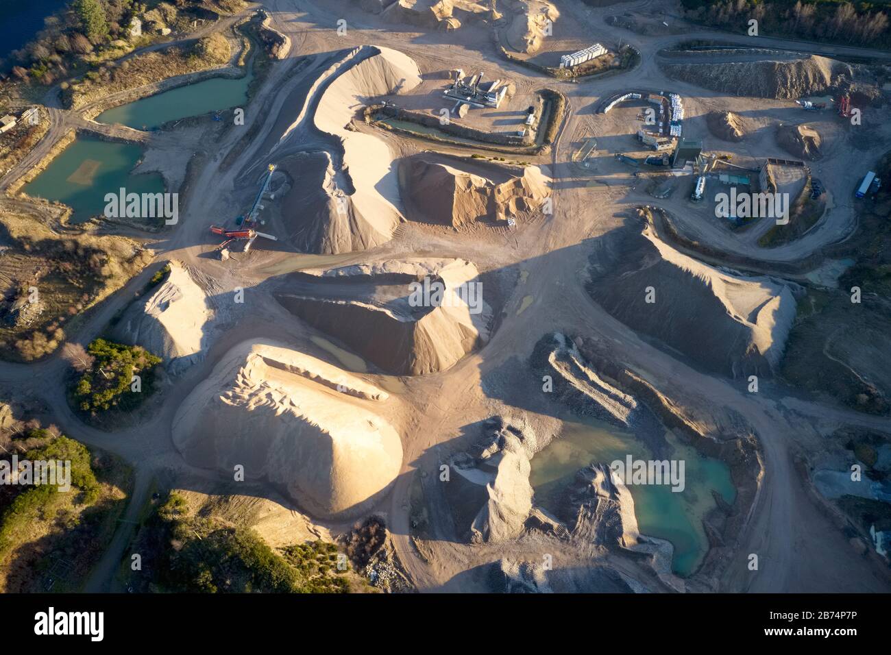 Quarry works industrial digging aerial view from above showing sand ...