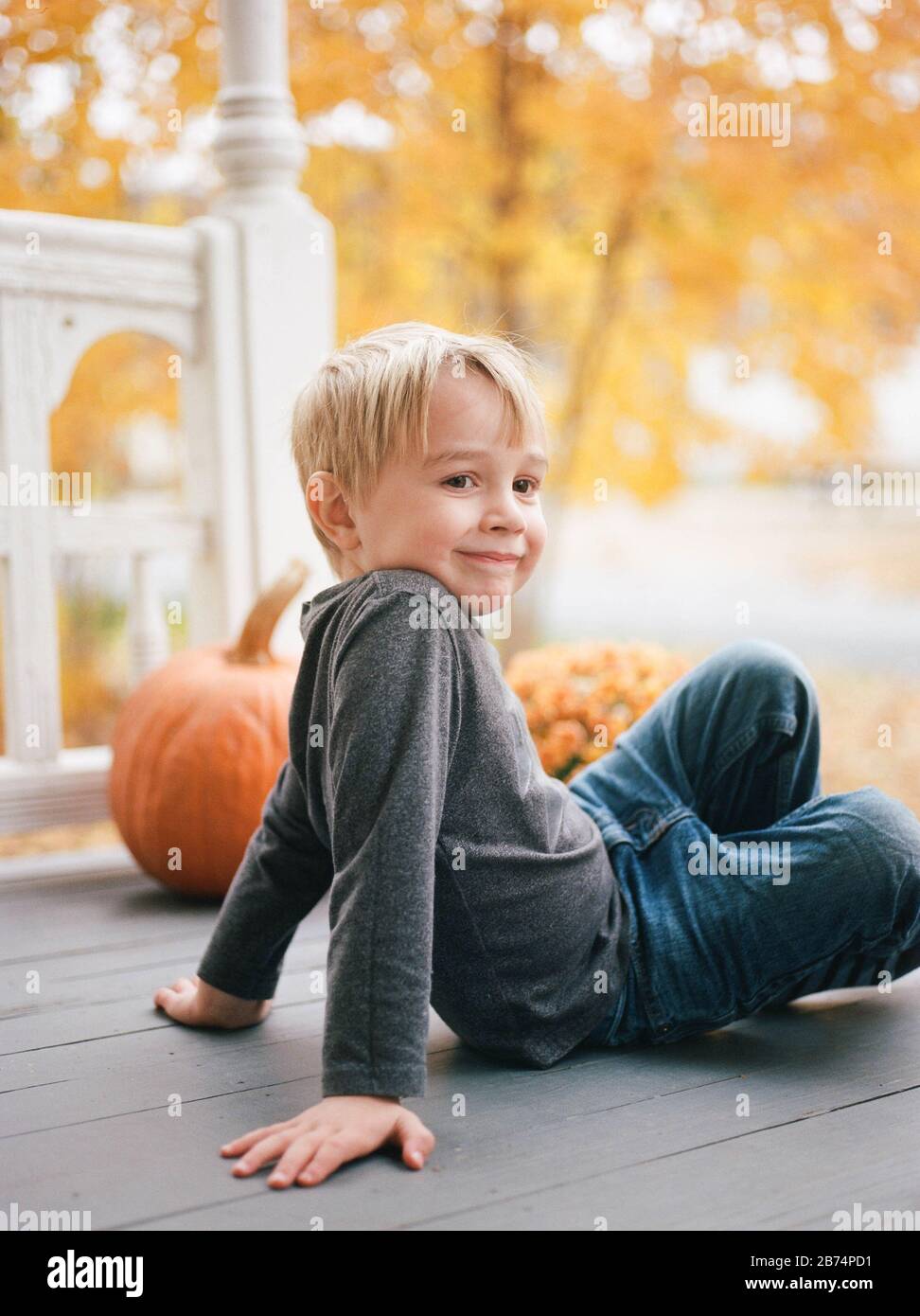 Sitting on a porch hi-res stock photography and images - Alamy