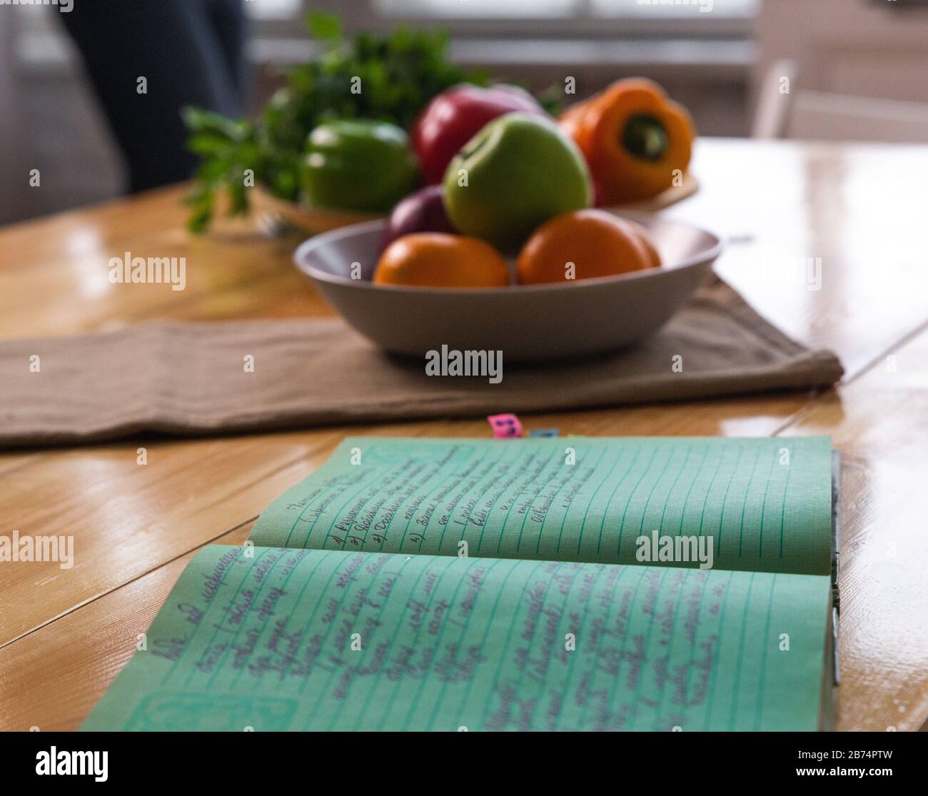 Spices and old recipe book on wooden background Stock Photo - Alamy