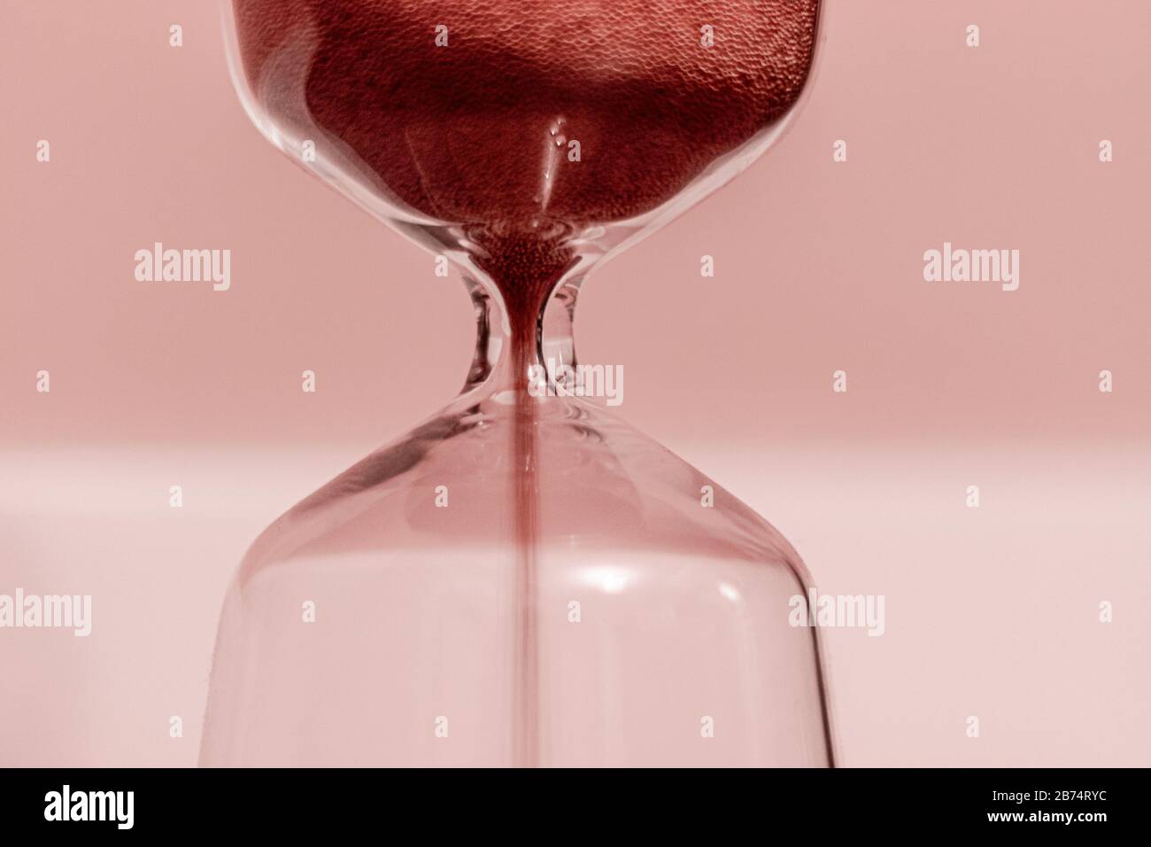 Red hourglass hi-res stock photography and images - Alamy