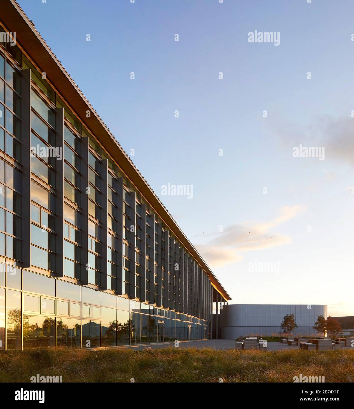 Building facade with terrace at staff entrance. Jaguar Land Rover ...