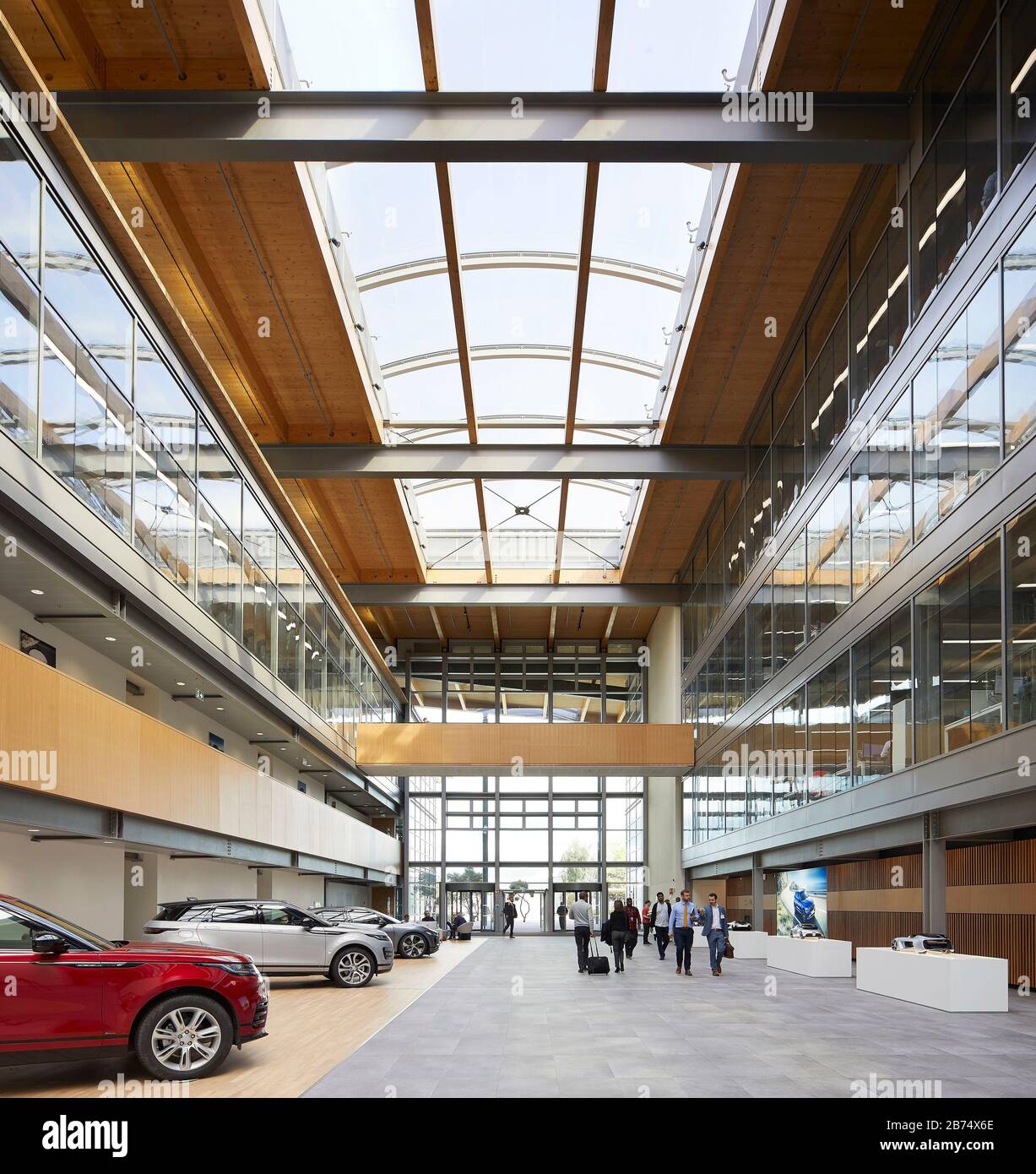 Full height atrium with car model display and view to main entrance ...
