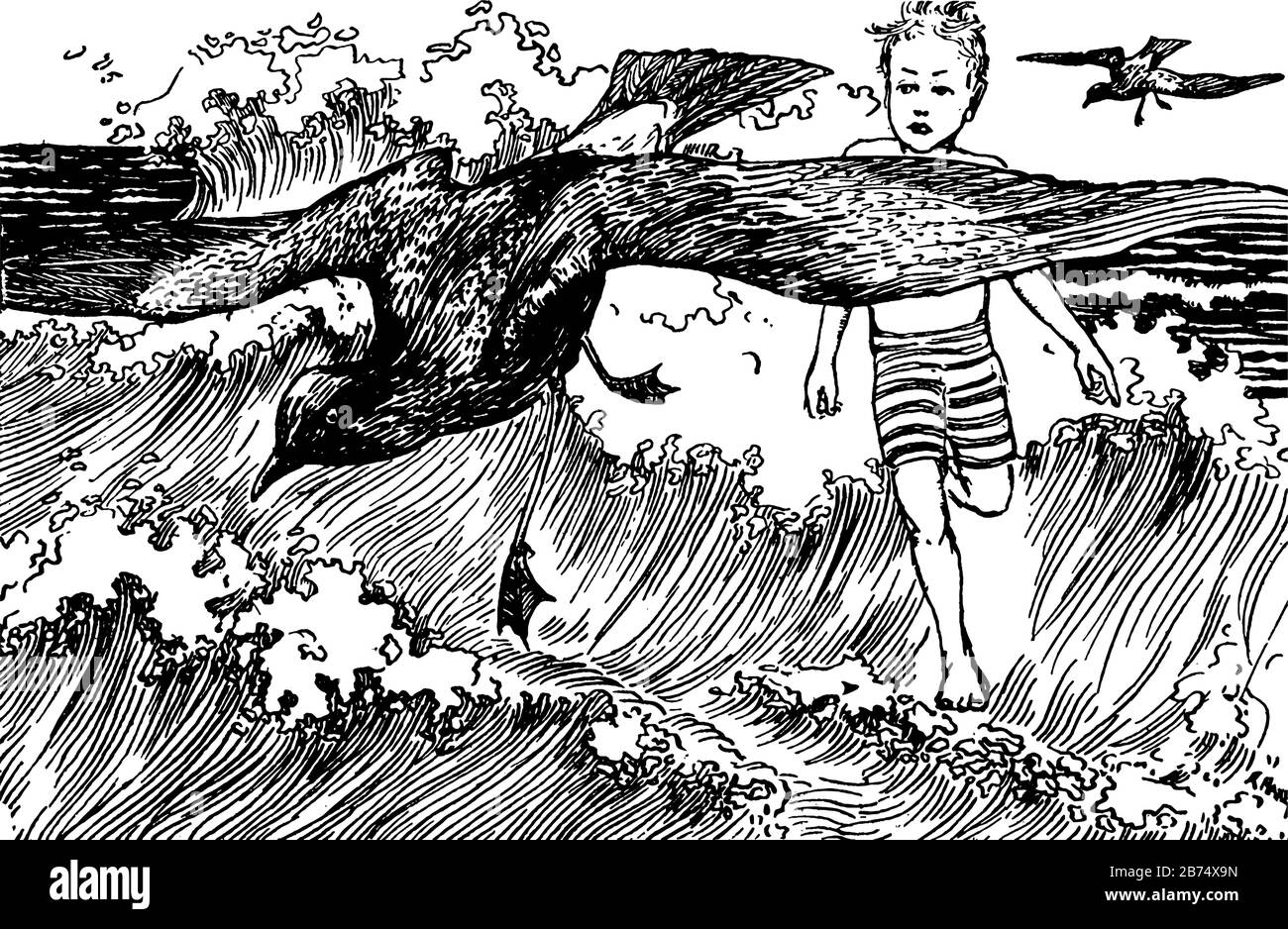 A flying bird and child running behind bird above the water in the sea ...