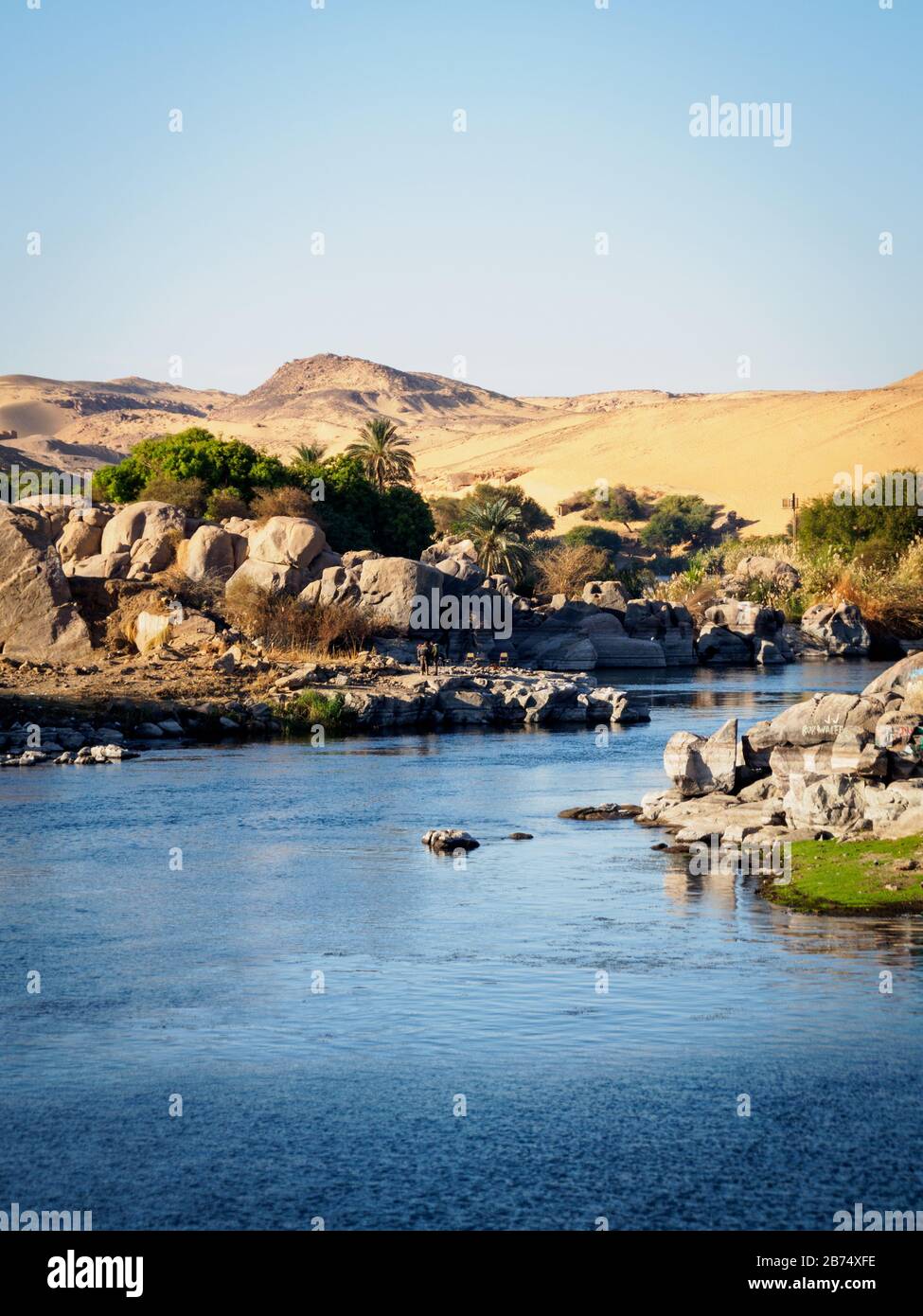 The majestic river Nile in Aswan in Egypt forms a beautiful landscape ...