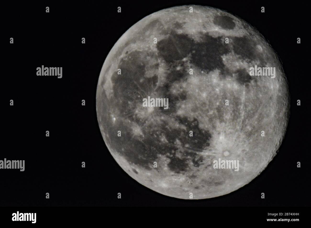 Shot of a full moon from a telescope Stock Photo - Alamy