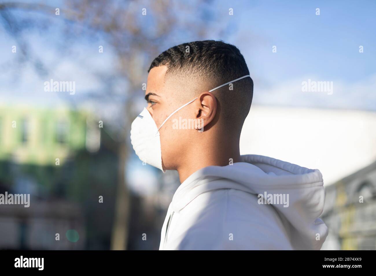 man wearing protective facial mask against transmissible infectious ...