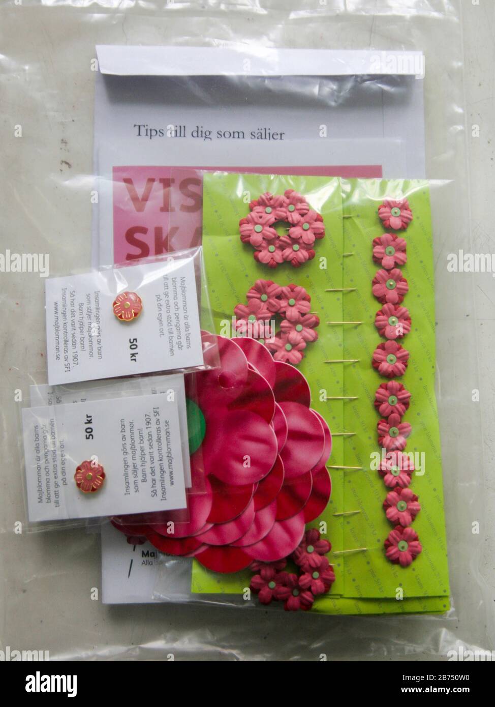 Workers make Remembrance red poppy flower at Good Luck Factory in ...