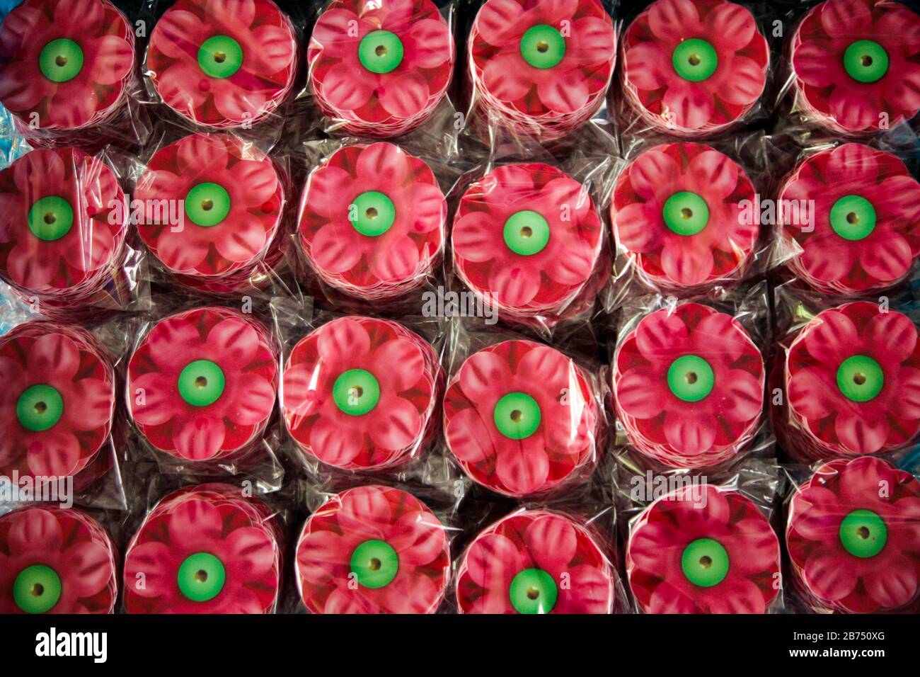 Workers make Remembrance red poppy flower at Good Luck Factory in ...