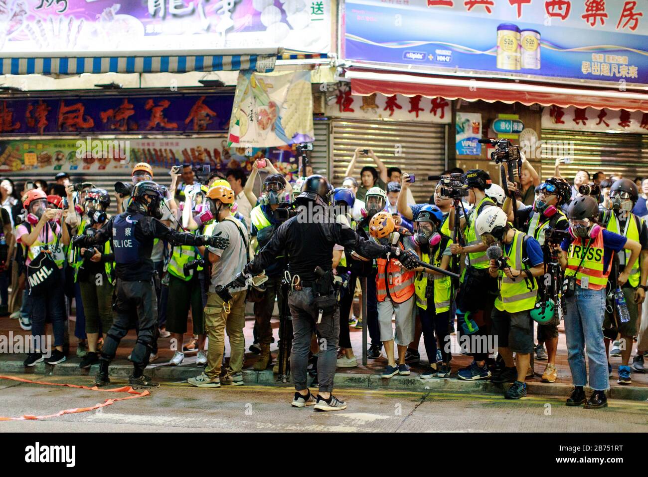 Police demand reporters to stay on padestrian walk. Police fire tear ...