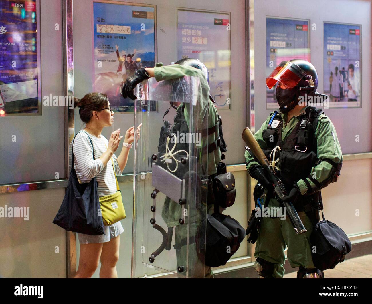 Police stop people from going forward in their sealed area. Police fire ...