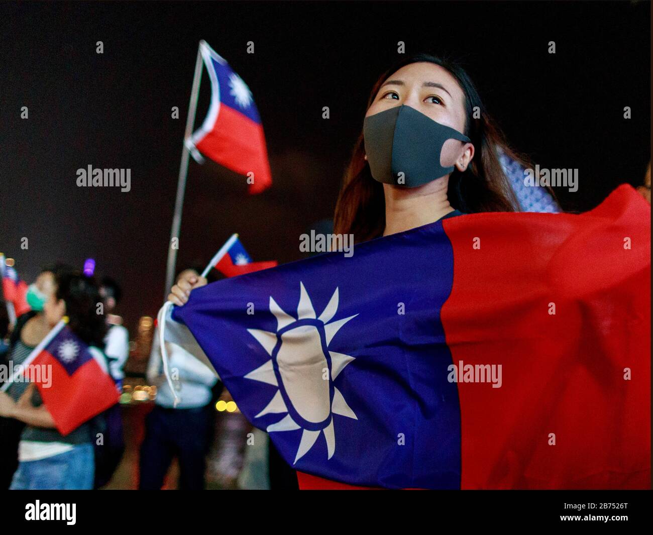 Hong Kongers hold Taiwan's national flag to celebrate the national day ...