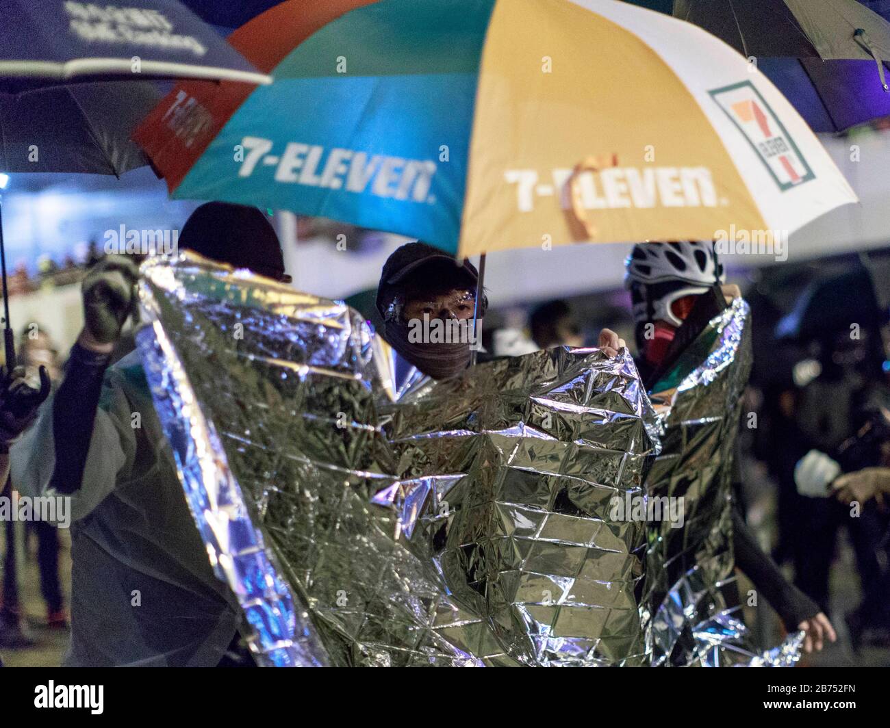 Protesters confront with the police on the 5th anniversary of umbrella ...