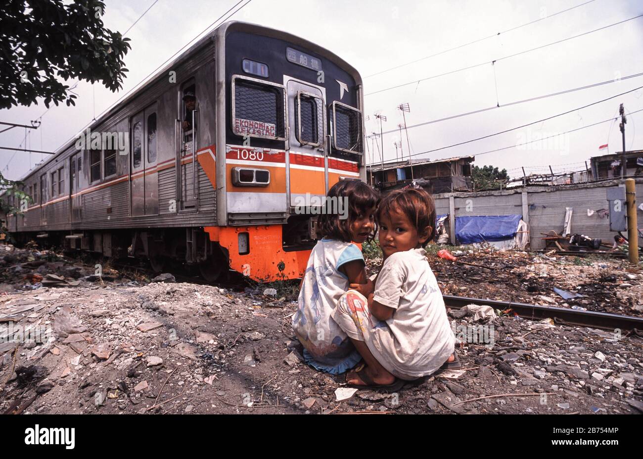 08.08.2009, Jakarta, Java, Indonesia, Asia - Two little girls sit next ...