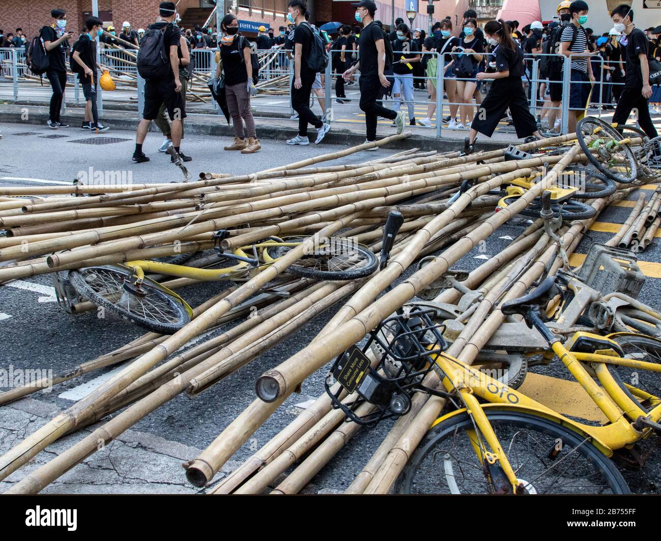 Protesters build barricade to block traffic in Hong Kong Stock Photo ...